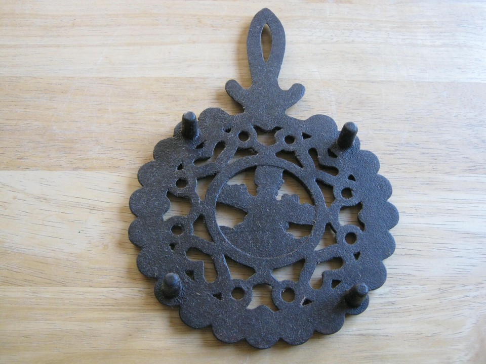 Vintage Cast Iron Trivet with Hearts and Handle | eBay