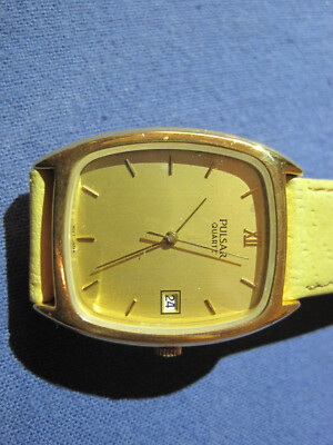 H 582 unisex gold plate PULSAR date watch | eBay