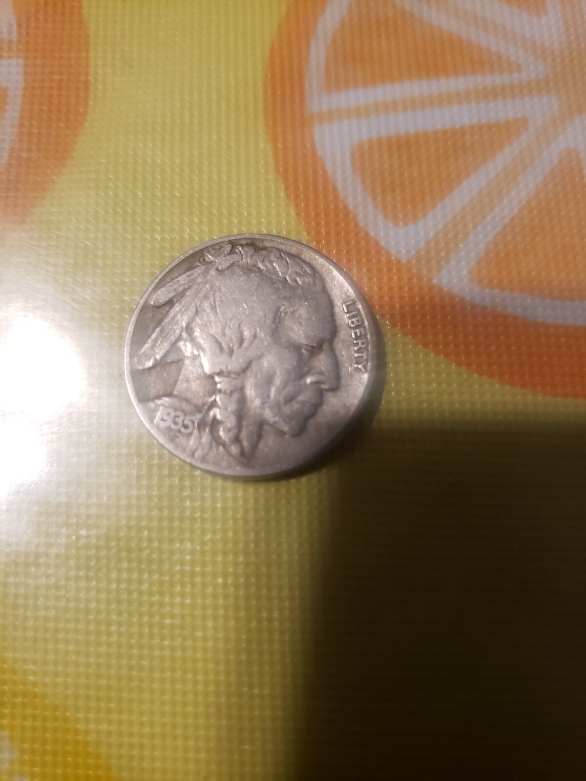 1935 indian head nickle with Buffalo in back old coin but able to read ...