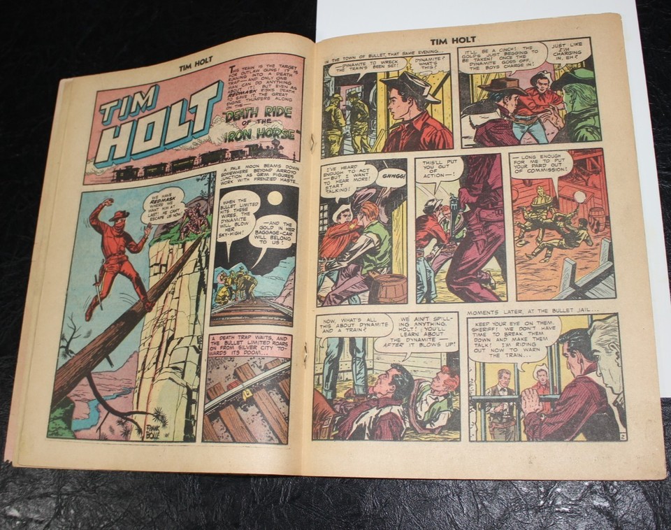 AUCTION .. GOLDEN Age comic - TIM HOLT #36 .. western w/ GHOST RIDER ...