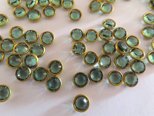 50 Swarovski Channel Rhinestones 29ss Erinite/brass settings. | eBay