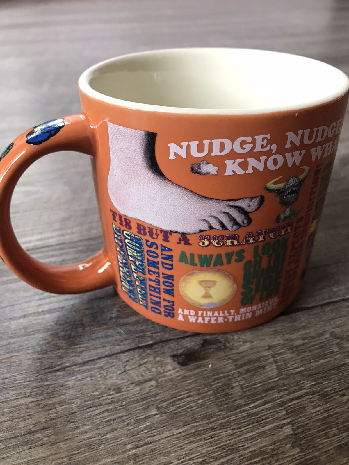 Monty Python Coffee Mug |12oz Orange Quotes 2013 | Logo inside cup ...