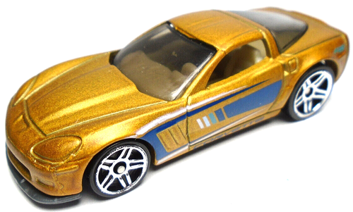 2010 HOT WHEELS CHEVY CORVETTE GOLD 1:64 DIECAST 2.75" CAR W BLUE WHITE ...