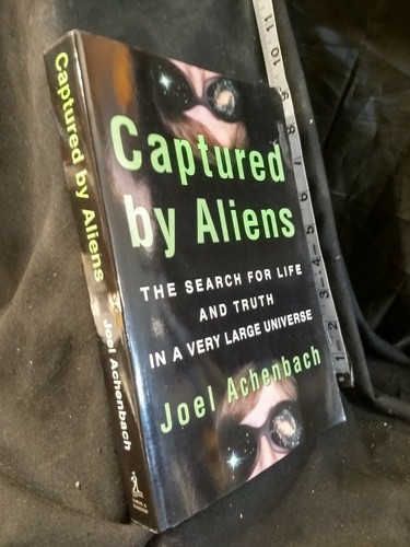 Captured by Aliens : The Search for Life and Truth in a Very Large ...