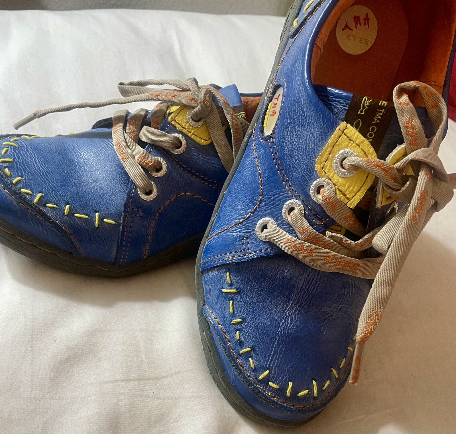 TMA EYES BLUE STITCH ACCENT LEATHER WALKING SHOES Sne… - Gem