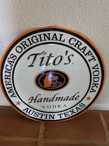 Tito's handmade vodka 17.5 inch round medal tin sign Austin Texas craft ...