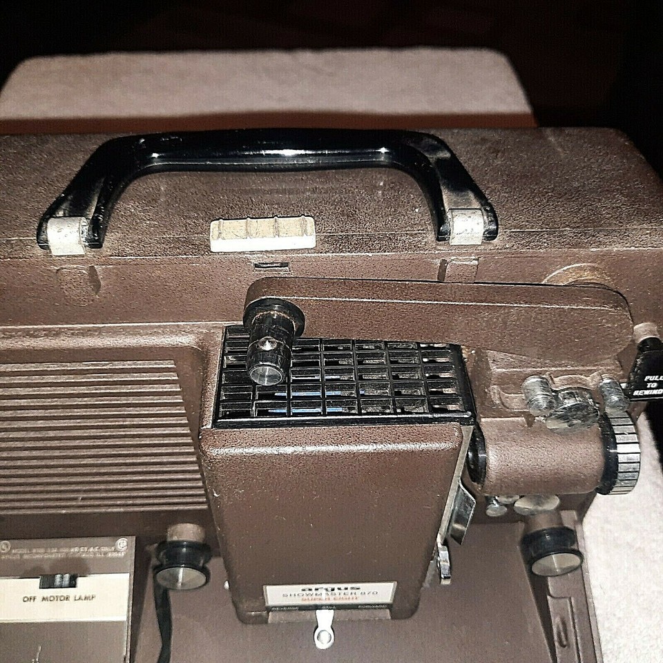 ARGUS, SHOWMASTER MDL 870B SUPER 8 MOVIE PROJECTOR, 1 REEL, POWERS UP ...