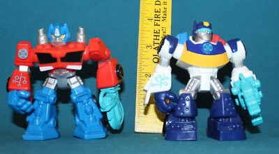 TRANSFORMERS Rescue Bots Chase & Optimus Prime figures - energize cop ...