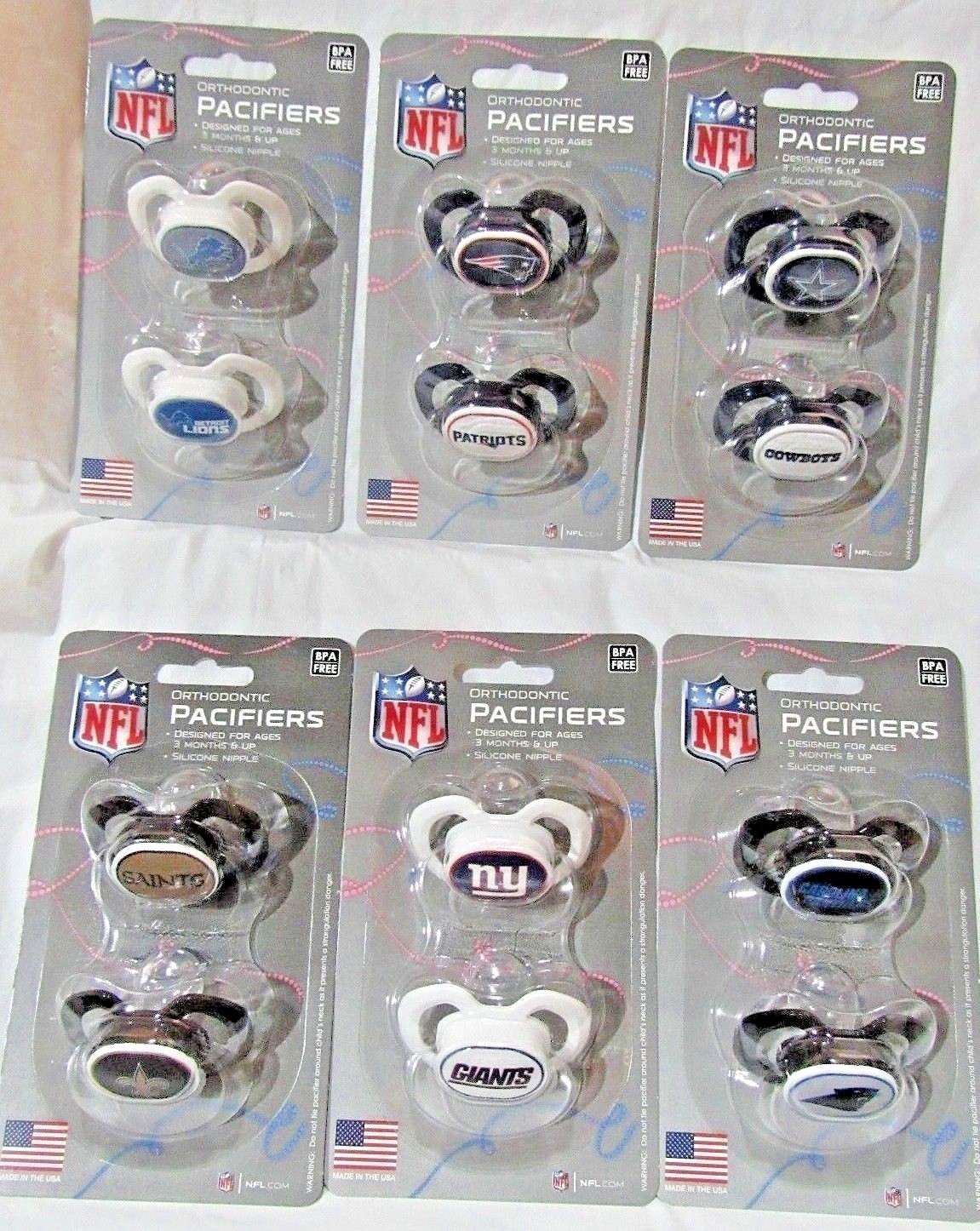 NFL Pacifiers Set of 2 Images Color Shield w/ Holes on Card -Select ...