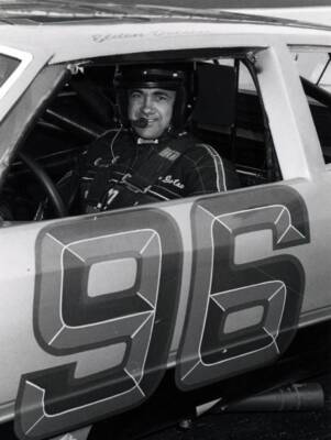 Jerry Bowman take a few photos before starting the Budweiser 500. B ...