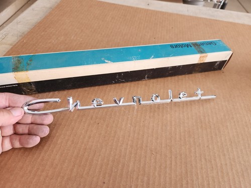 1957 Chevy NOS Chrome "Chevrolet" Script Emblem GM 3733212 | eBay