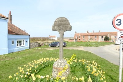 Photo A2 Brancaster Staithe village sign In the semi-circular carving ...