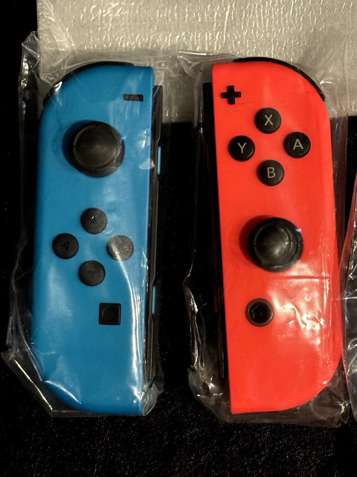 NEW Nintendo Switch Joy-Con Controllers NEON RED/BLUE with Grip and ...