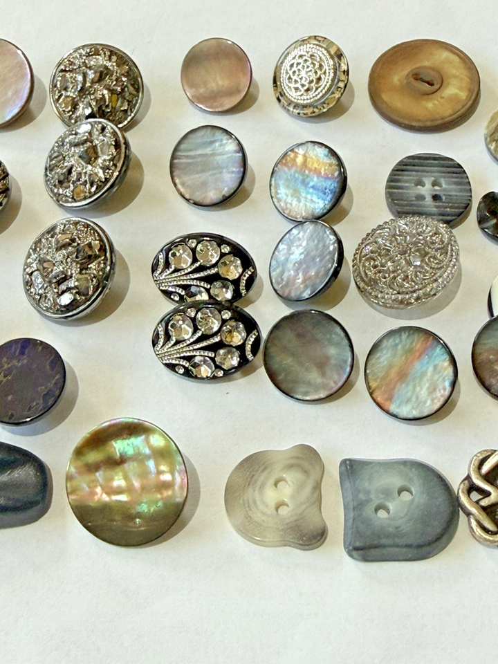 Pretty ornate unusual Buttons in mainly black tones some with gemstones ...