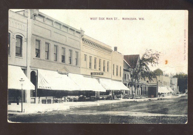MARKESAN WISCONSIN DOWNTOWN STREET SCENE BAKERY VINTAGE POSTCARD GREEN ...
