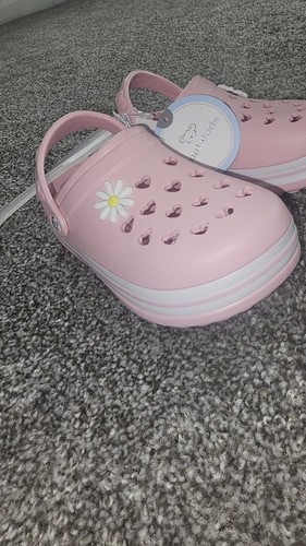 Koala Kids Crocs light pink with a daisy and heart shaped vent holes ...