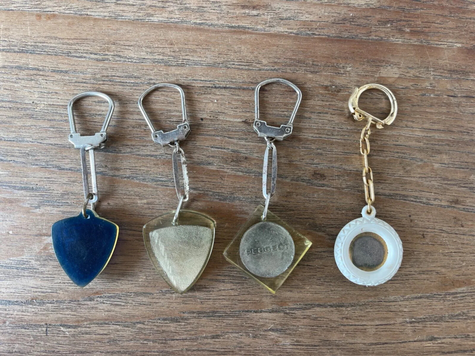 Peugeot Keychains lot of 4 Plastic Metal and tires keychains 1960's | eBay