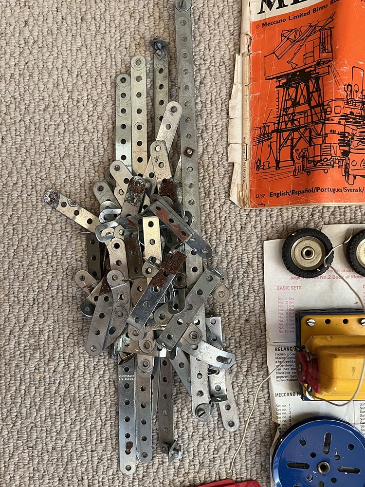 Meccano 1970's assorted parts, gears, wheels, motor and manuals, job ...