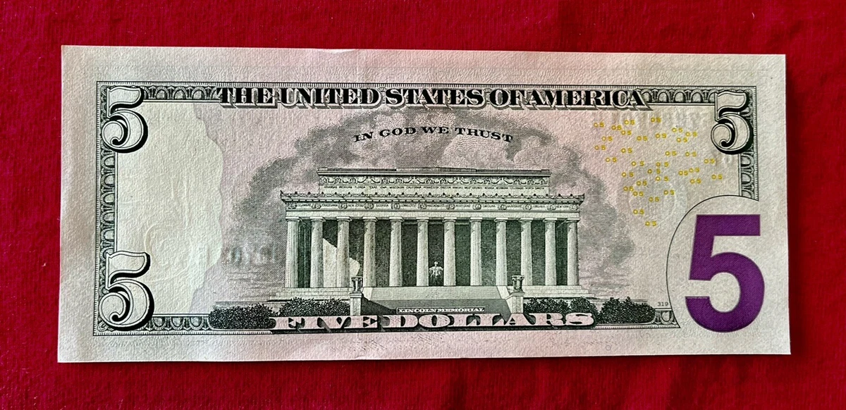 Stacks Of 5 Dollar Bills