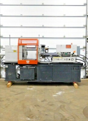 Injection & Blow Molding - Ton Injection Molding Machine