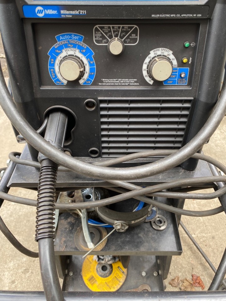 Millermatic 211 mig welder Miller 110v/240v with rolling cart and 25/75 ...