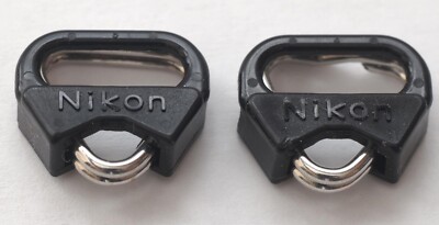 Two NIKON Triangular Camera Strap Lugs with Plastic Protectors | eBay
