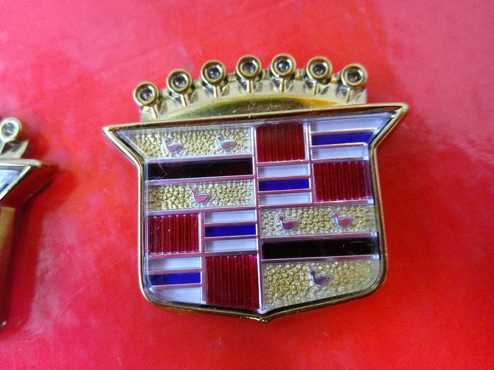 Two gold Cadillac Crests, OEM GM parts, emblems badges logos insignia ...