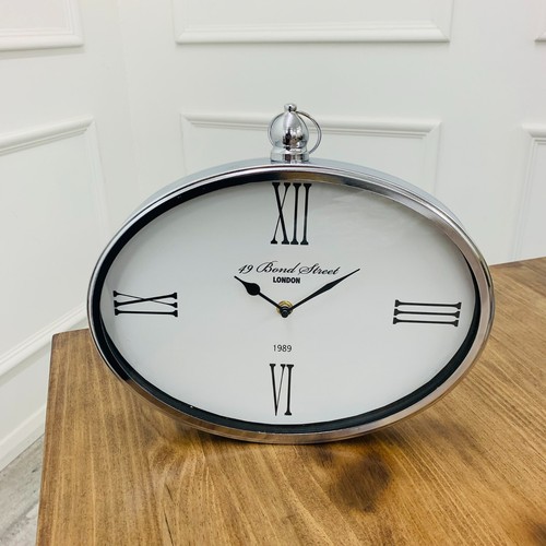 Medium Wall Mounted Oval Clock 49 Bond Street London Roman Numerals 33 ...