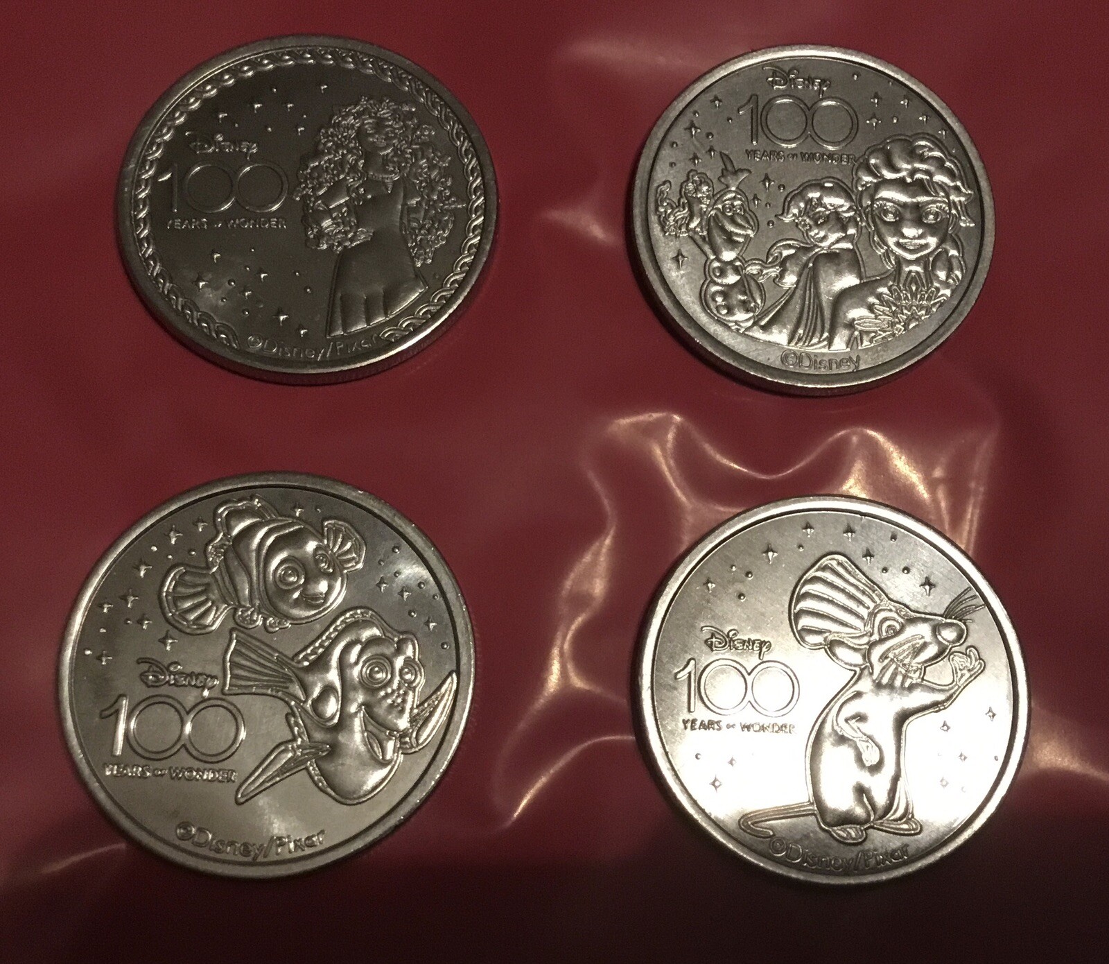 Disney World 100 Years of Wonder Medallion 4 Coin Set - Frozen Merida ...