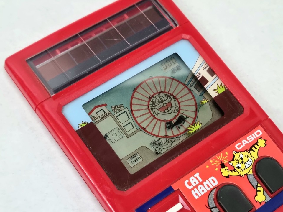 Casio CAT HAND CG-32 LCD electronic handheld game and watch TESTED ...