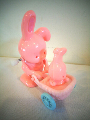 VINTAGE PINK PLASTIC MOMMA RABBIT PUSHING BABY BUNNY IN CARRIAGE WIND ...