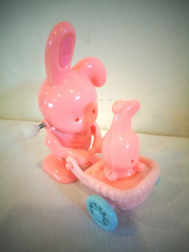VINTAGE PINK PLASTIC MOMMA RABBIT PUSHING BABY BUNNY IN CARRIAGE WIND ...