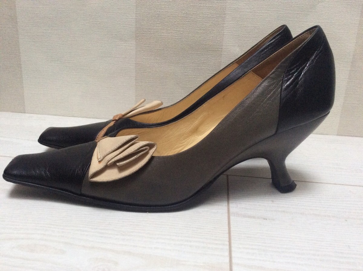 Vintage 90s MIU MIU Leather Kitten Bell Heel Pumps. Made in Vintage 90s MIU MIU Leather Kitten Bell Heel Pumps. Made in