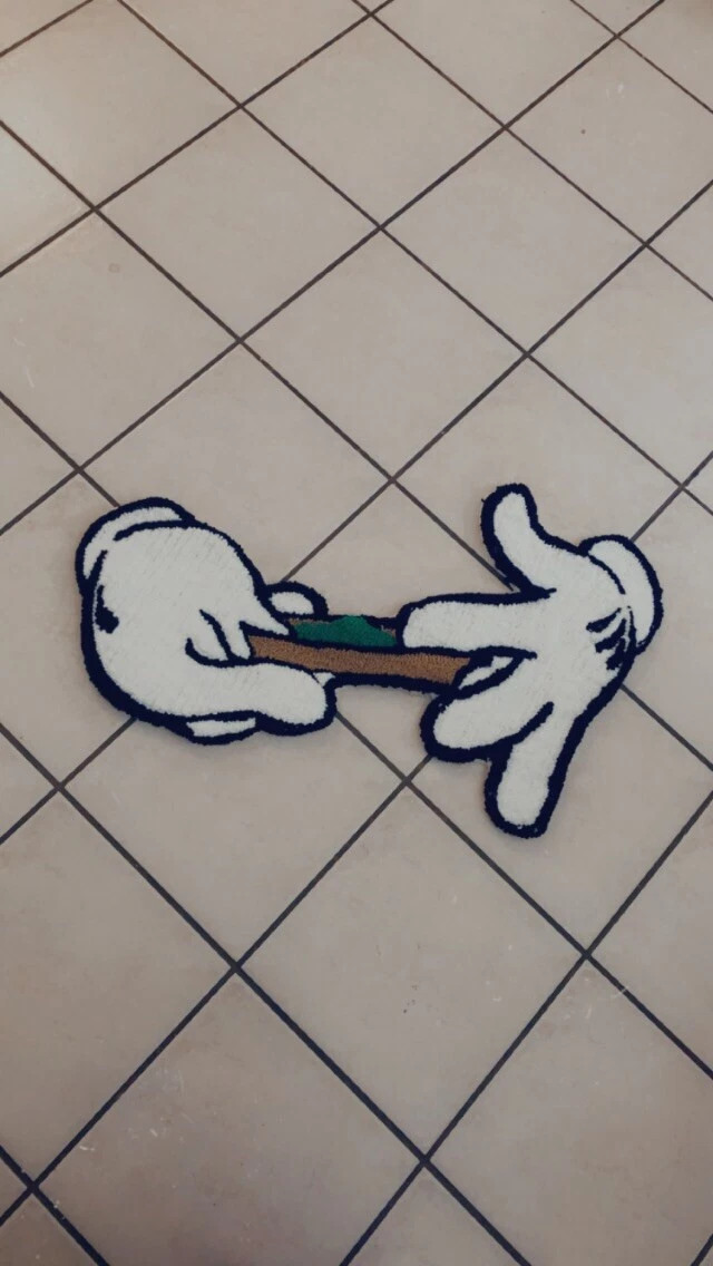 Mickey Mouse Hands Rolling Blunt