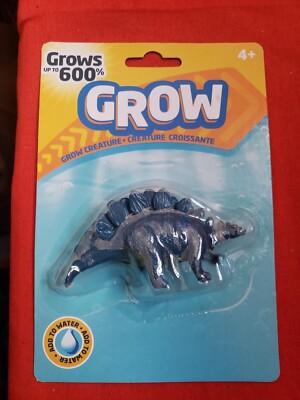 MAGIC GROW CREATURE STEGOSAURUS DINOSAUR TOY WATCH IT GROW TO 600% IN ...