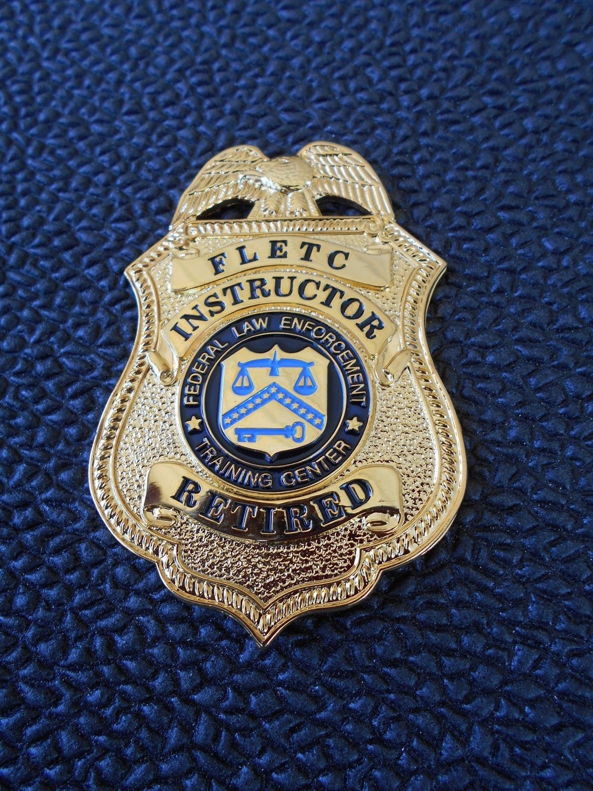 Federal Shield - FLETC - STAFF Retired | eBay