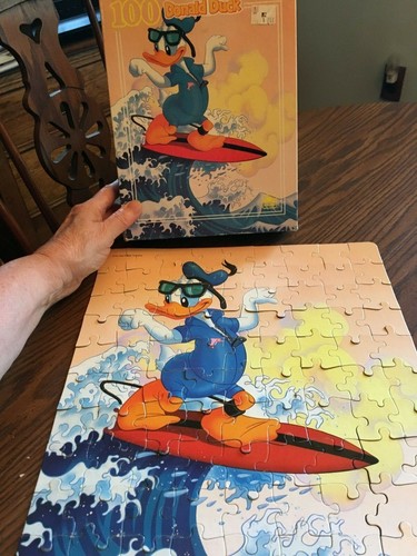 puzzle Donald Duck surfing,. 100 pieces. Golden. 11.5 x 15 inches. Ages ...