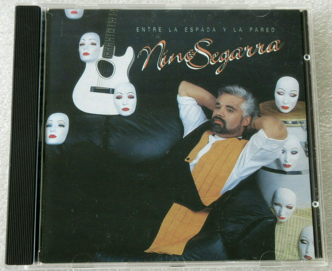 NINO SEGARRA / "ENTRE LA ESPADA Y LA PARED" CD 1990 M.P. CANADA LATIN ...