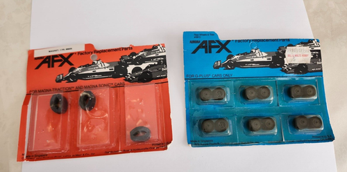 LOT OF 2 AFX RACING PARTS MINT ON CARD! ! REAR WHEEL & TIRES AND ...