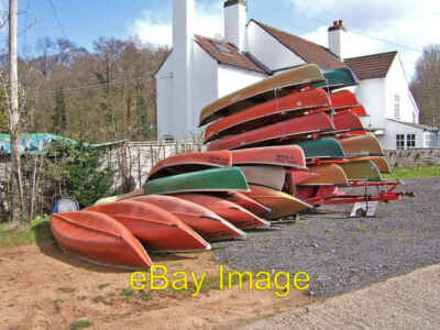 Photo 6x4 Canoe stack Hampton/SO7486 These canoes are stacked here for ...