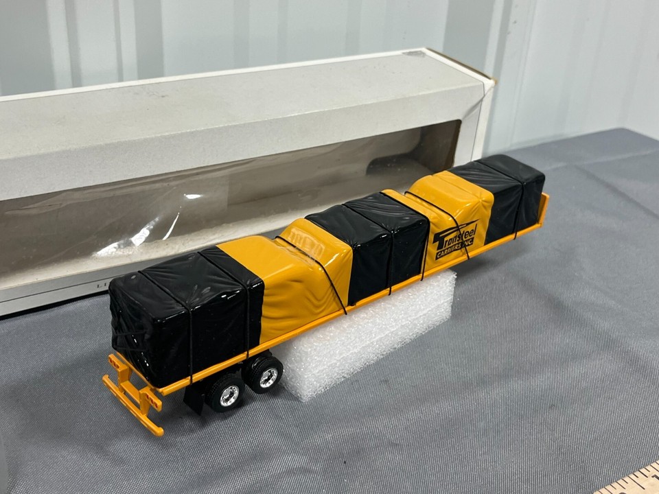 Peterbilt TRANSTEEL Carriers Flatbed Tarped Load 1:64 SpecCast NIB READ ...