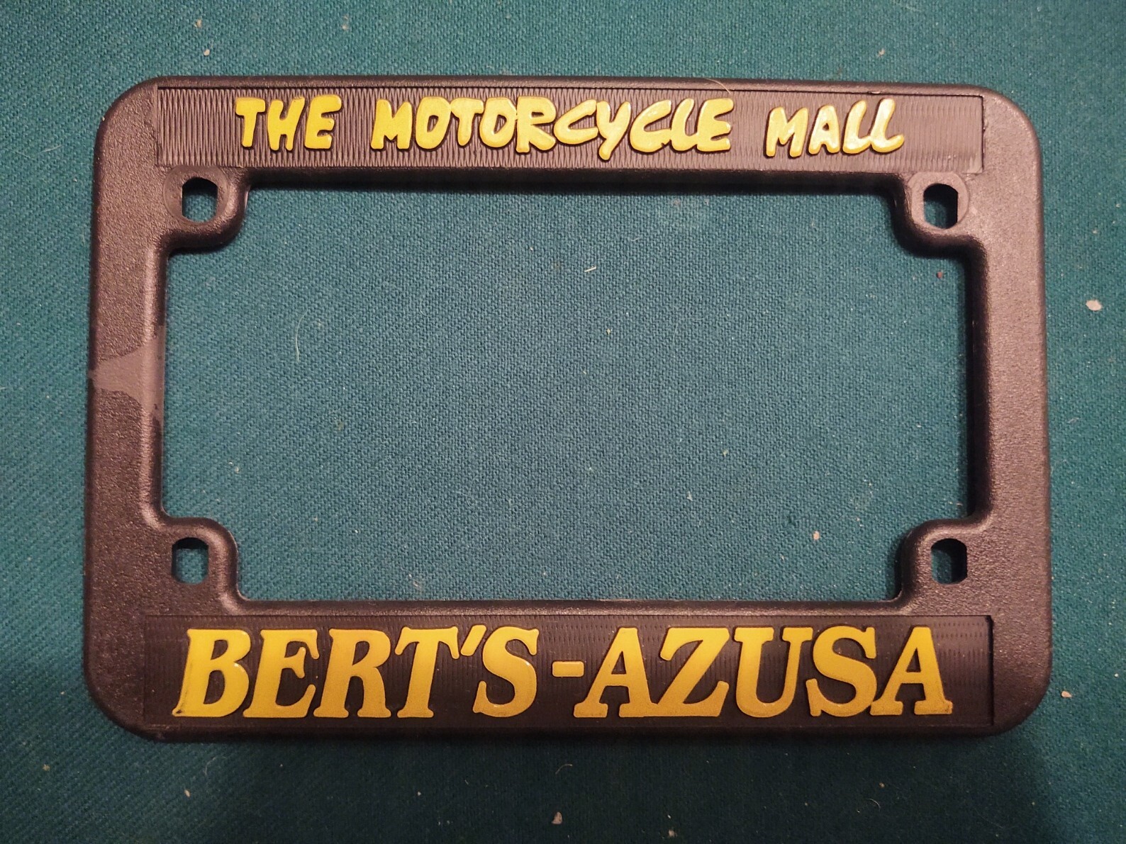 Motorcycle plastic license plate frame vintage Bert's M/C Mall | eBay