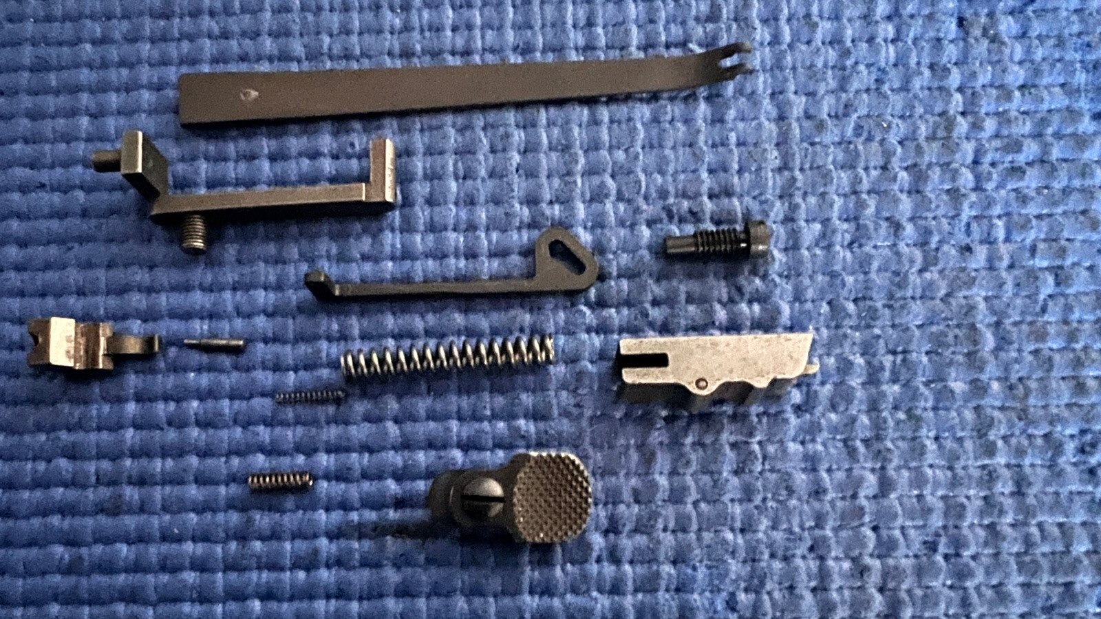 Smith & Wesson K Frame cylinder release main spring. Thumb Release etc ...