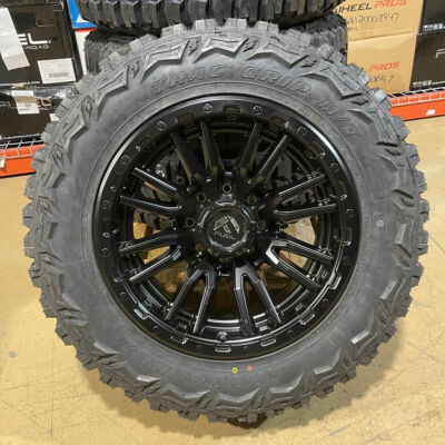 20x10 Fuel D679 Rebel Black Wheels 35" MT Tires 8x6.5 Dodge Ram 2500 ...