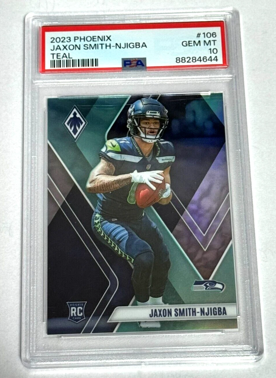 Jaxon Smith-Njigba 2023 Phoenix #106 Teal /150 Price Guide - Sports ...