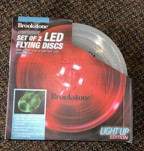 Brookstone Set of 2 LED Flying Discs, 1 Red and 1 Green | eBay