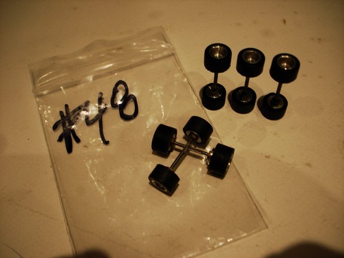 AJ'S ALUMINUM RIMS WITH SILICONE TIRES AND AXLE. ONE SET PER AUCTION ...