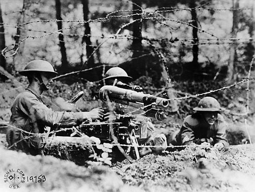 Three American soldiers operate a French 37 one pounder gun set fi- Old ...