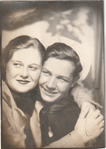 VINTAGE PHOTO BOOTH - ATTRACTIVE, AFFECTIONATE YOUNG COUPLE, CUDDLING ...
