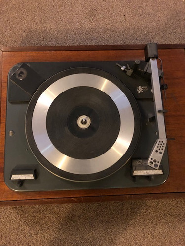 Garrard A70 vintage record deck on wooden plinth. Black/silver colour ...